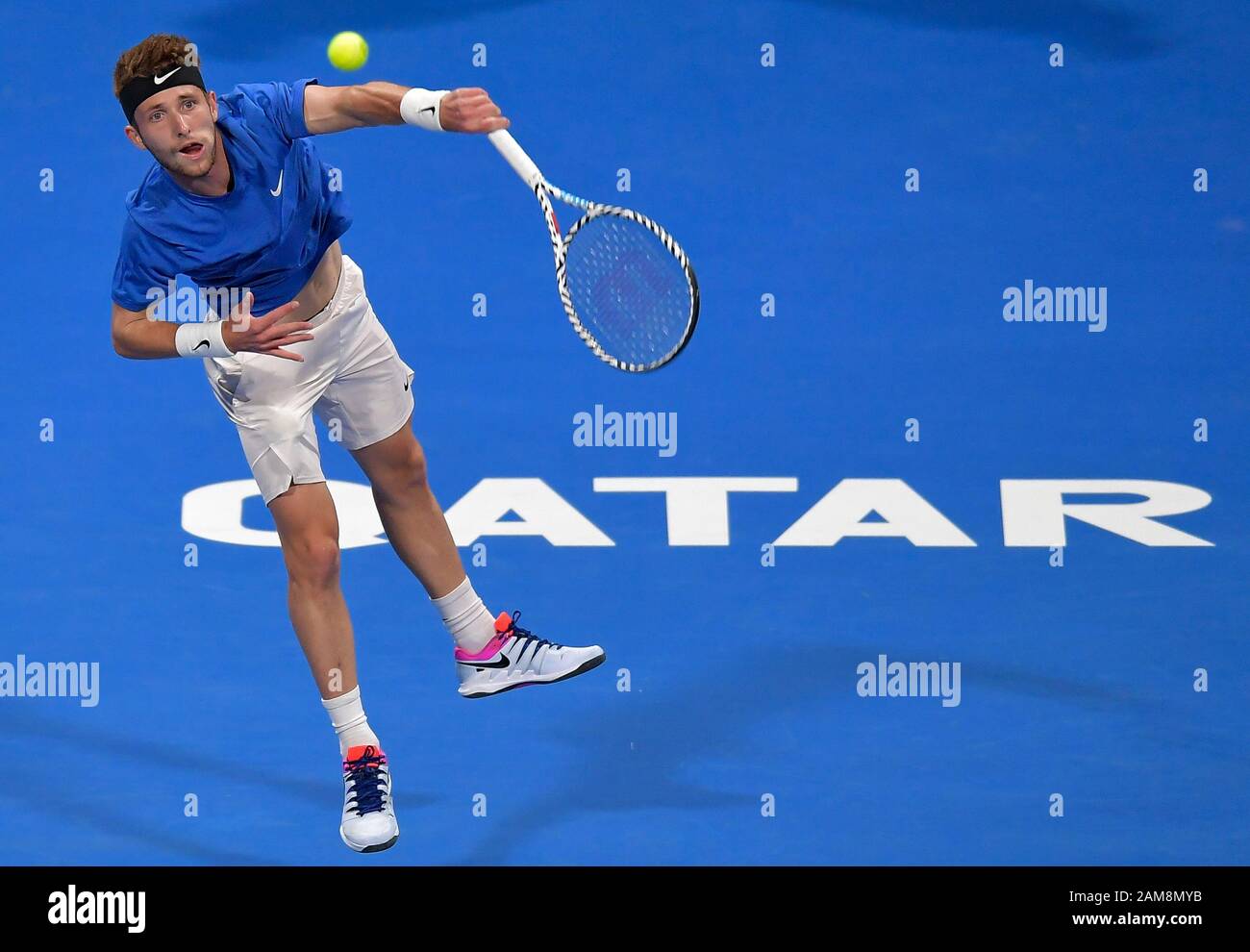 Doha, Qatar. 11th Jan, 2020. Corentin Moutet of France serves during the singles final match ...