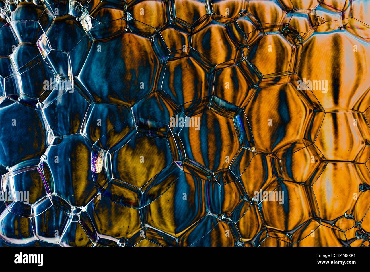 Oil bubbles inside water base form patterns Stock Photo - Alamy