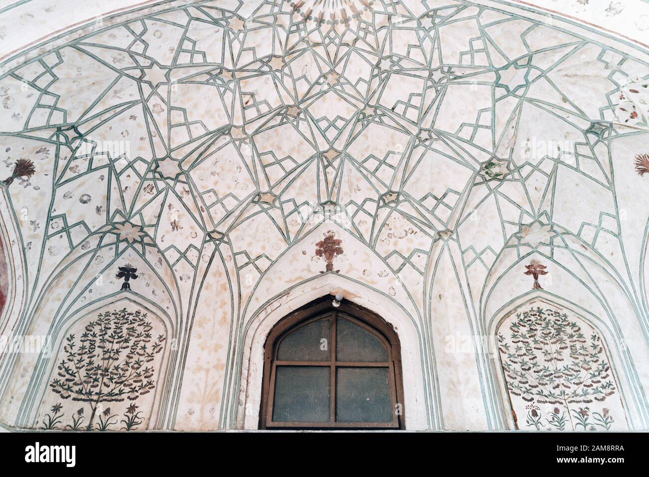 Detailed view of an intricate ceiling inside the ancient Red Fort ...