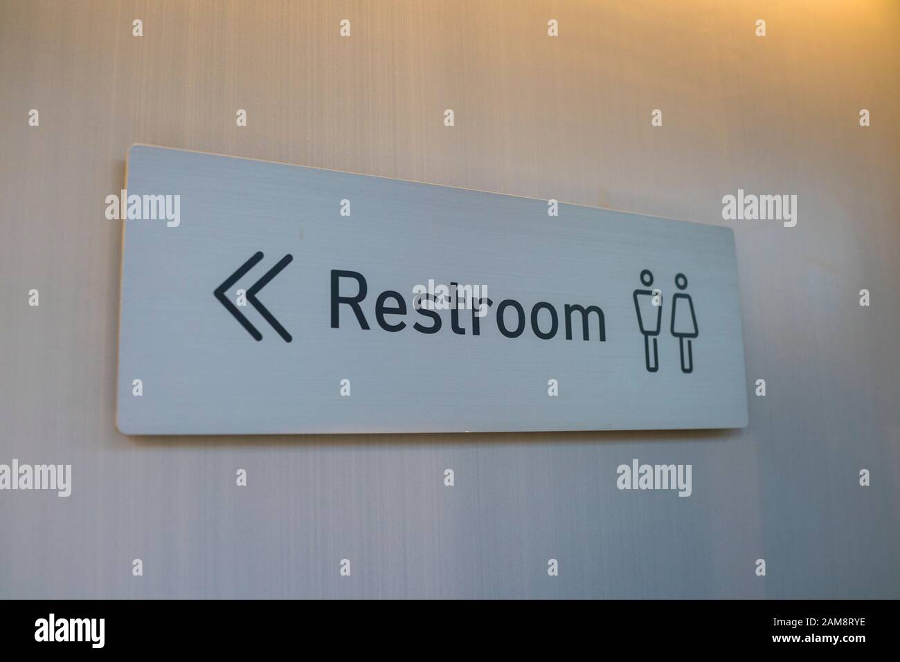 Way to the restroom. The sign stick on the wooden wall Stock Photo - Alamy