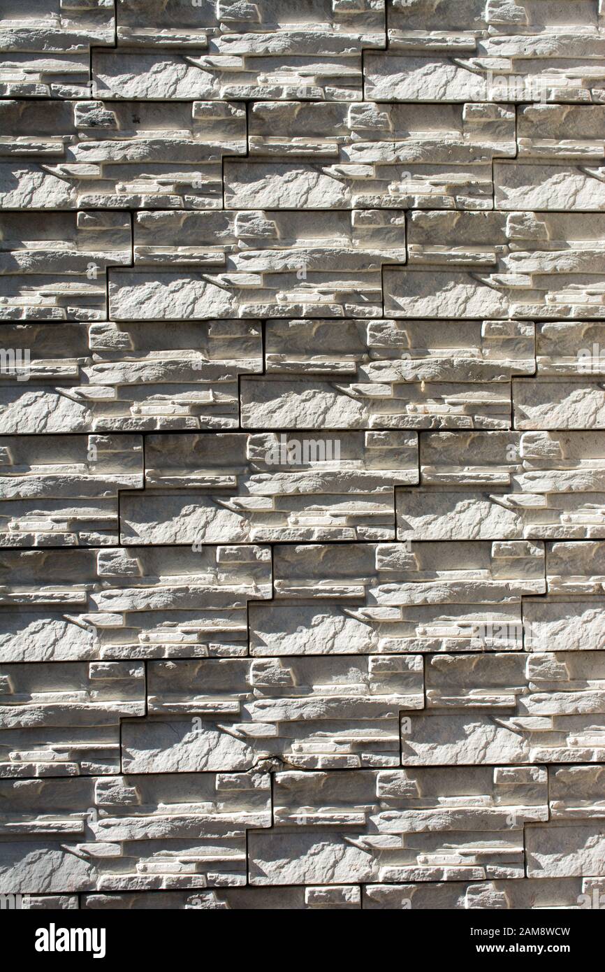 Decorative stone background built of little stones Stock Photo - Alamy