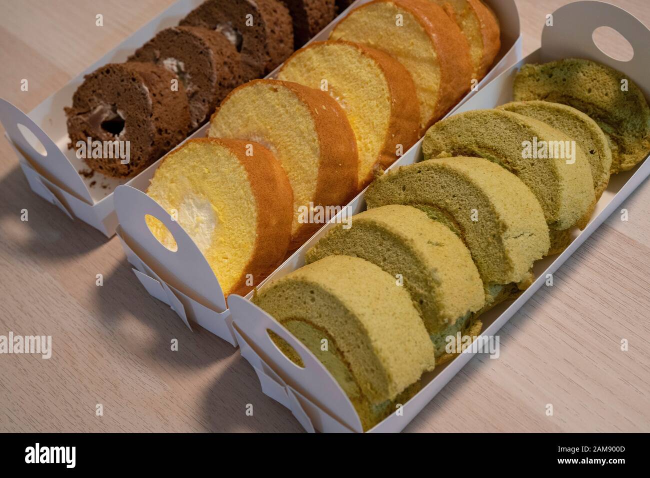 The delicious batch of cake rolls Stock Photo - Alamy