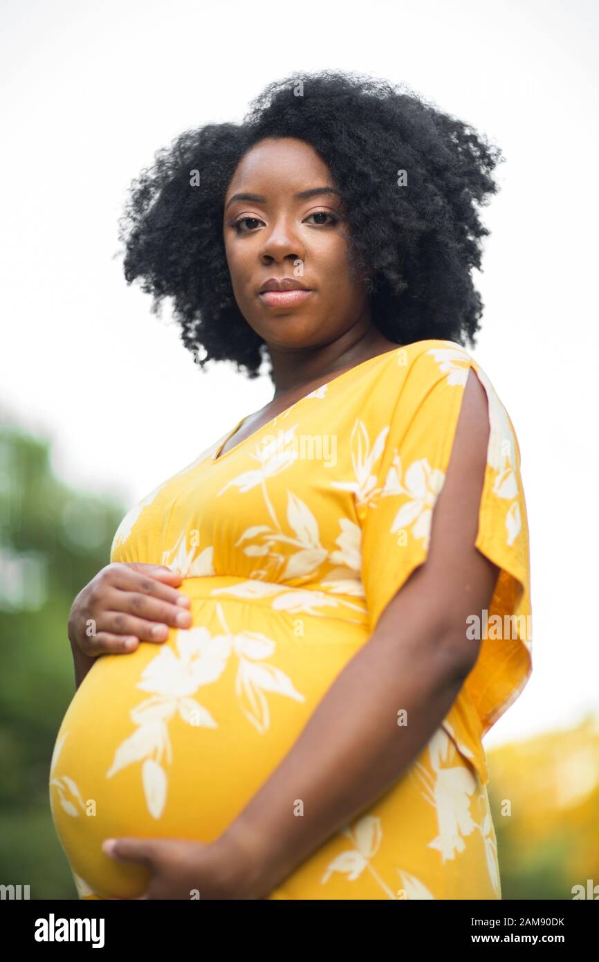 Portrait of a beautiful African American pregnant woman Stock Photo - Alamy