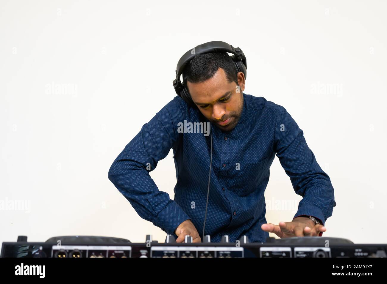 Dj playing music nightclub party man hi-res stock photography and ...