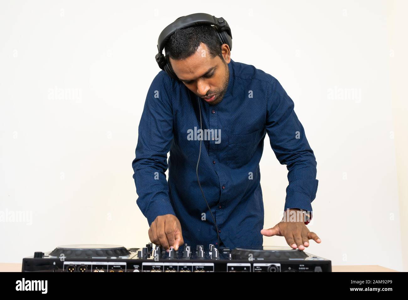Black male dj playing hi-res stock photography and images - Alamy