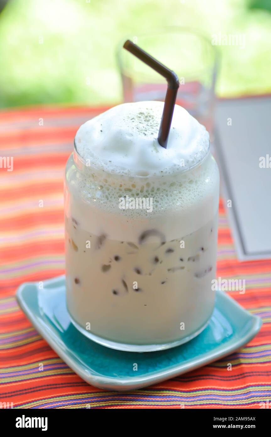 iced tea, milk tea with milk float topping Stock Photo - Alamy