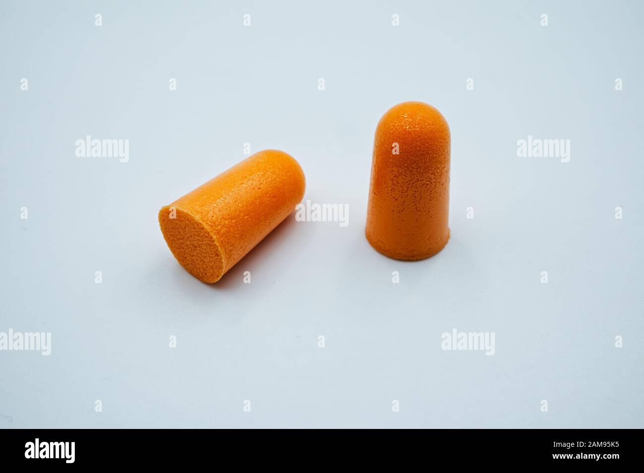 Ear plugs isolated on white background Stock Photo - Alamy