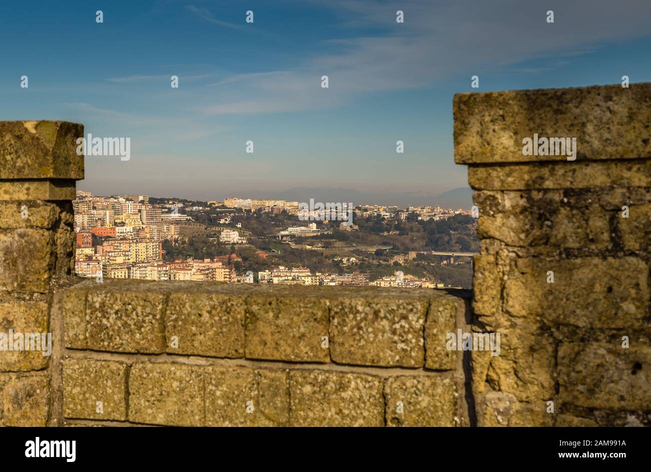 amazing view of the roofs of Napoli, Italy trough medieval rock window ...