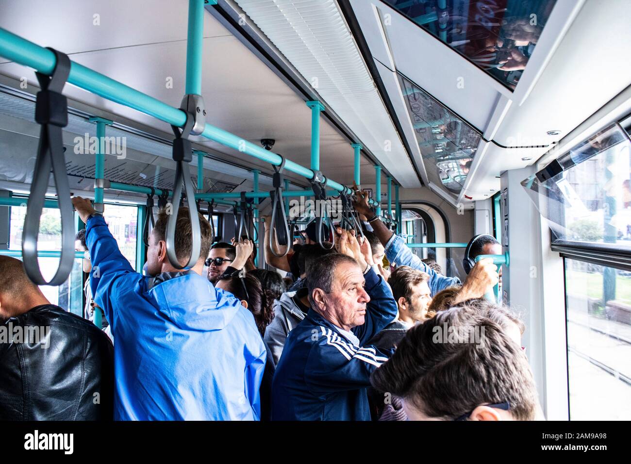 Metro bus crowded interior hi-res stock photography and images - Alamy