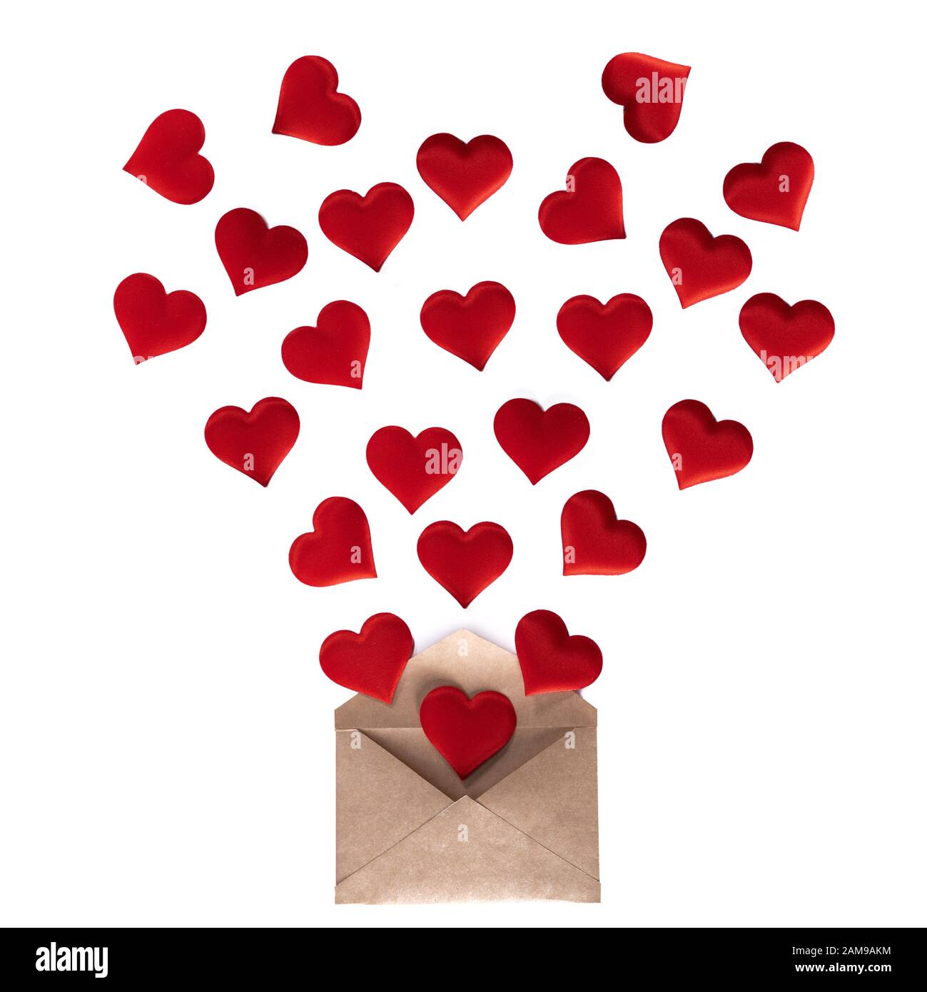 Valentine day love letter, envelope of craft paper with red hearts heap ...