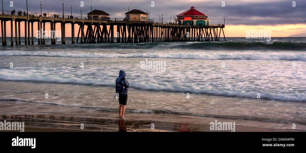 Painterly Landscape of the Huntington Beach Pier at Sunset. The human ...