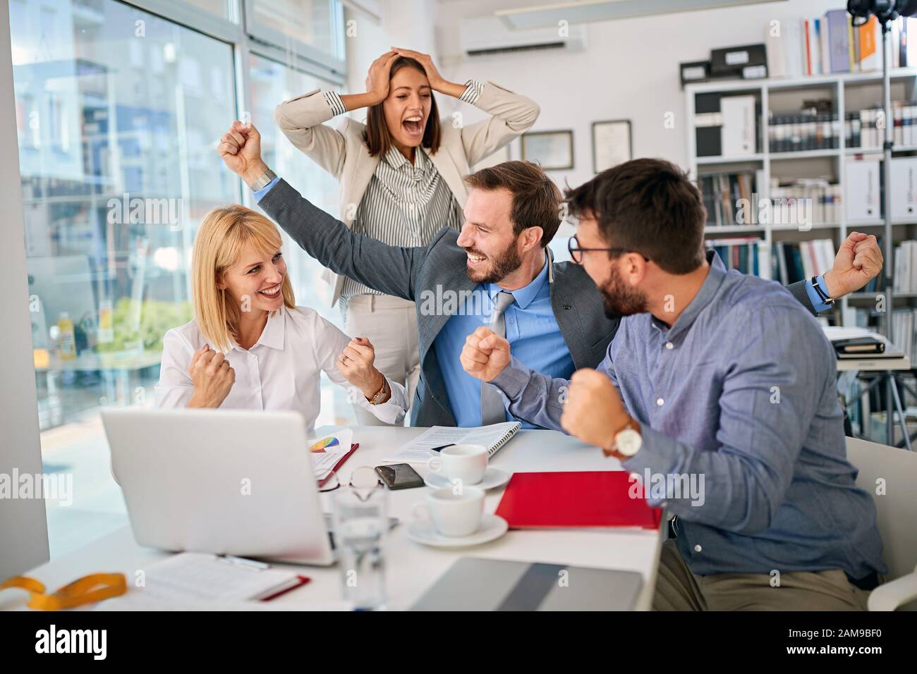 Happy business people completed successfully meeting Stock Photo - Alamy