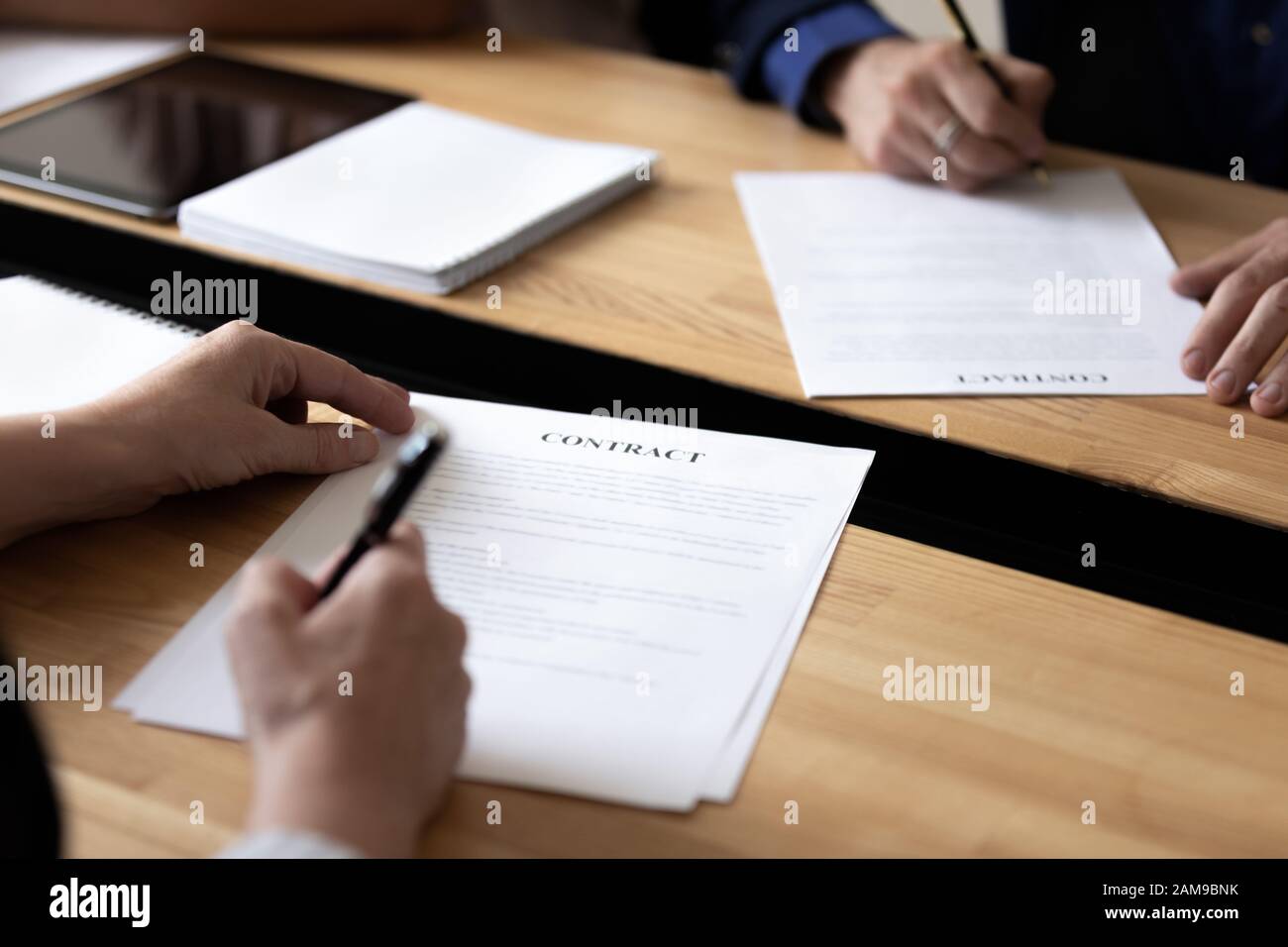 Holding pens hi-res stock photography and images - Alamy