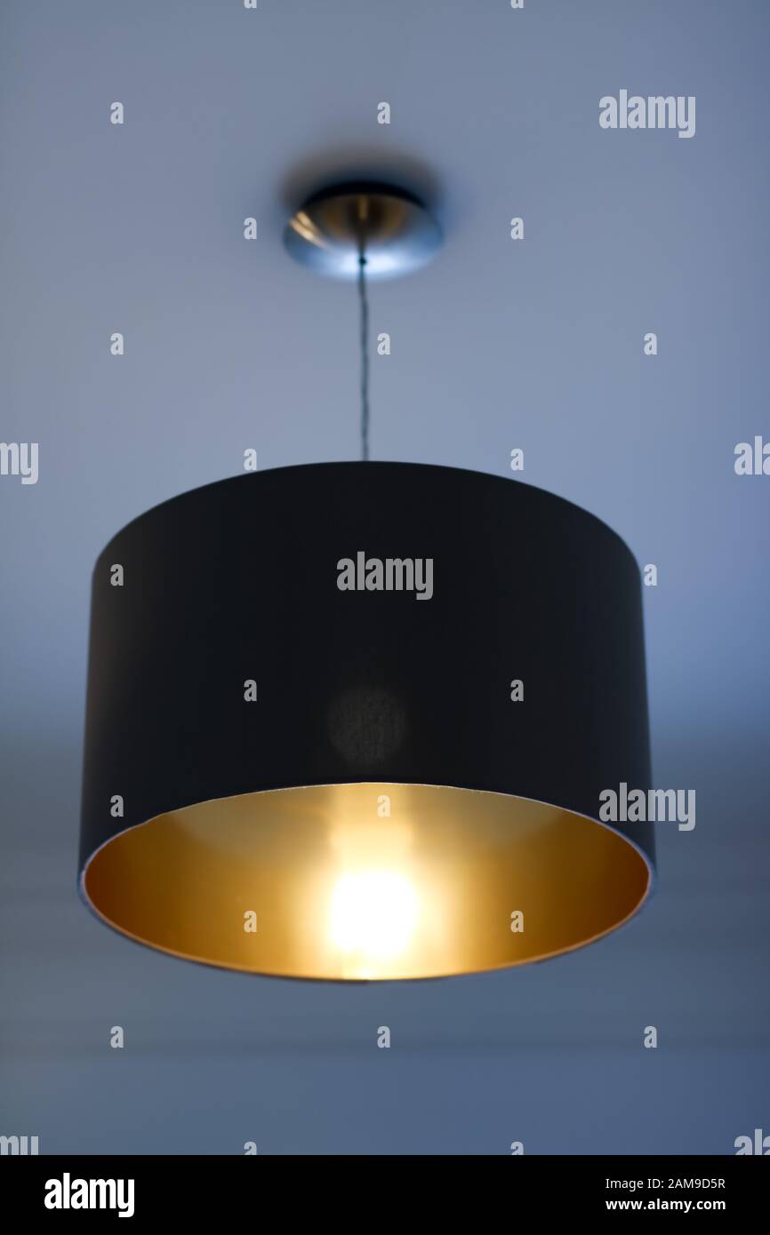 Interior design, indoor lamps and electricity concept - Golden lamp in ...