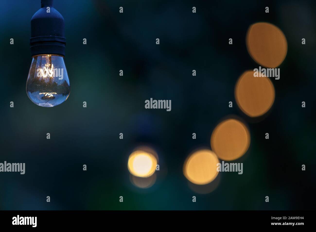 Lightbulb and Bokeh Stock Photo - Alamy
