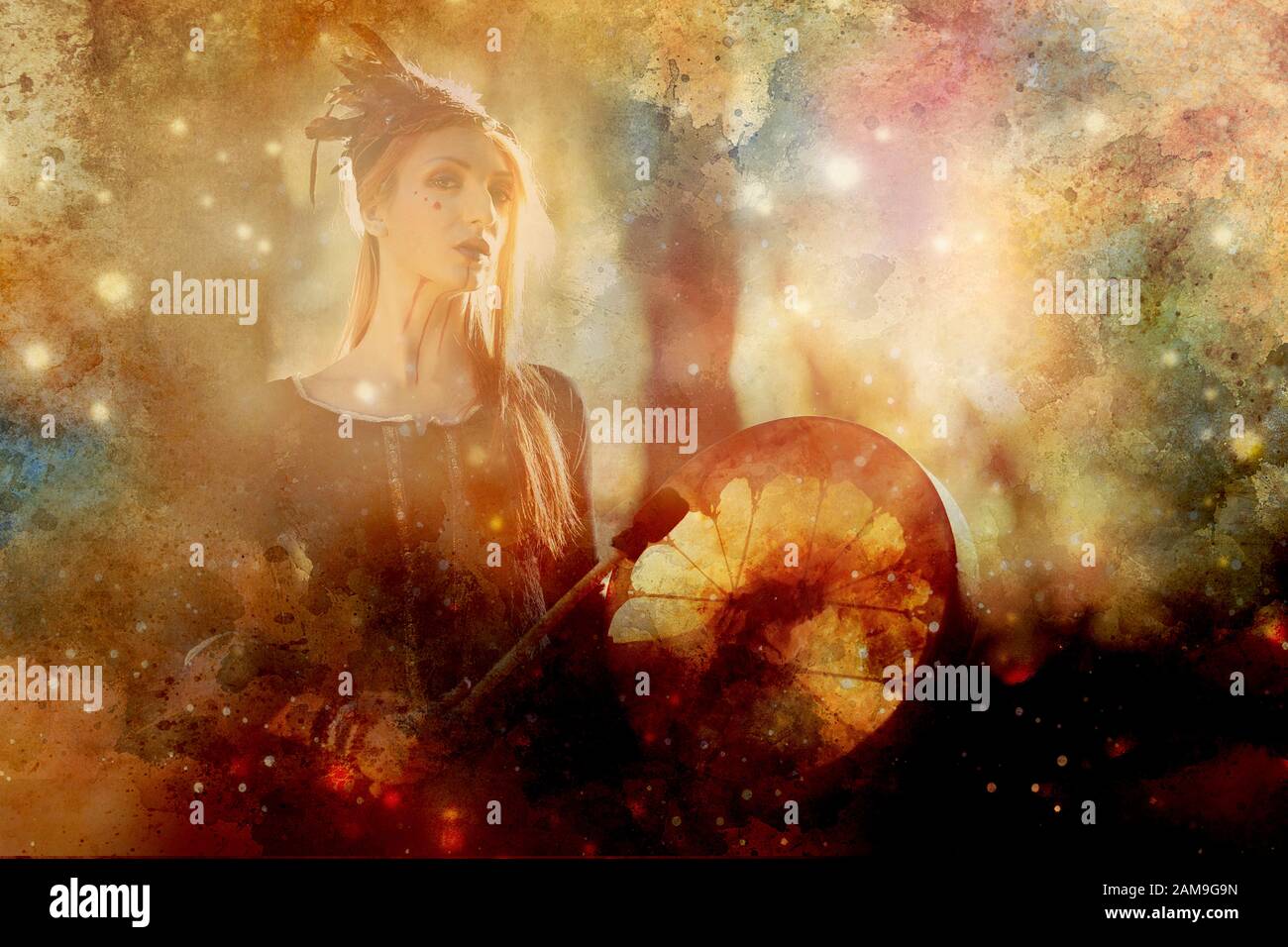 beautiful shamanic girl playing on shaman frame drum in the nature ...