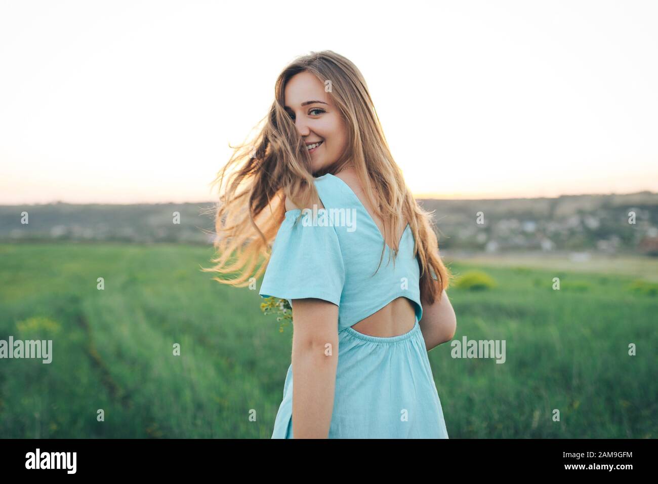 Woman running summer over shoulder hi-res stock photography and images ...