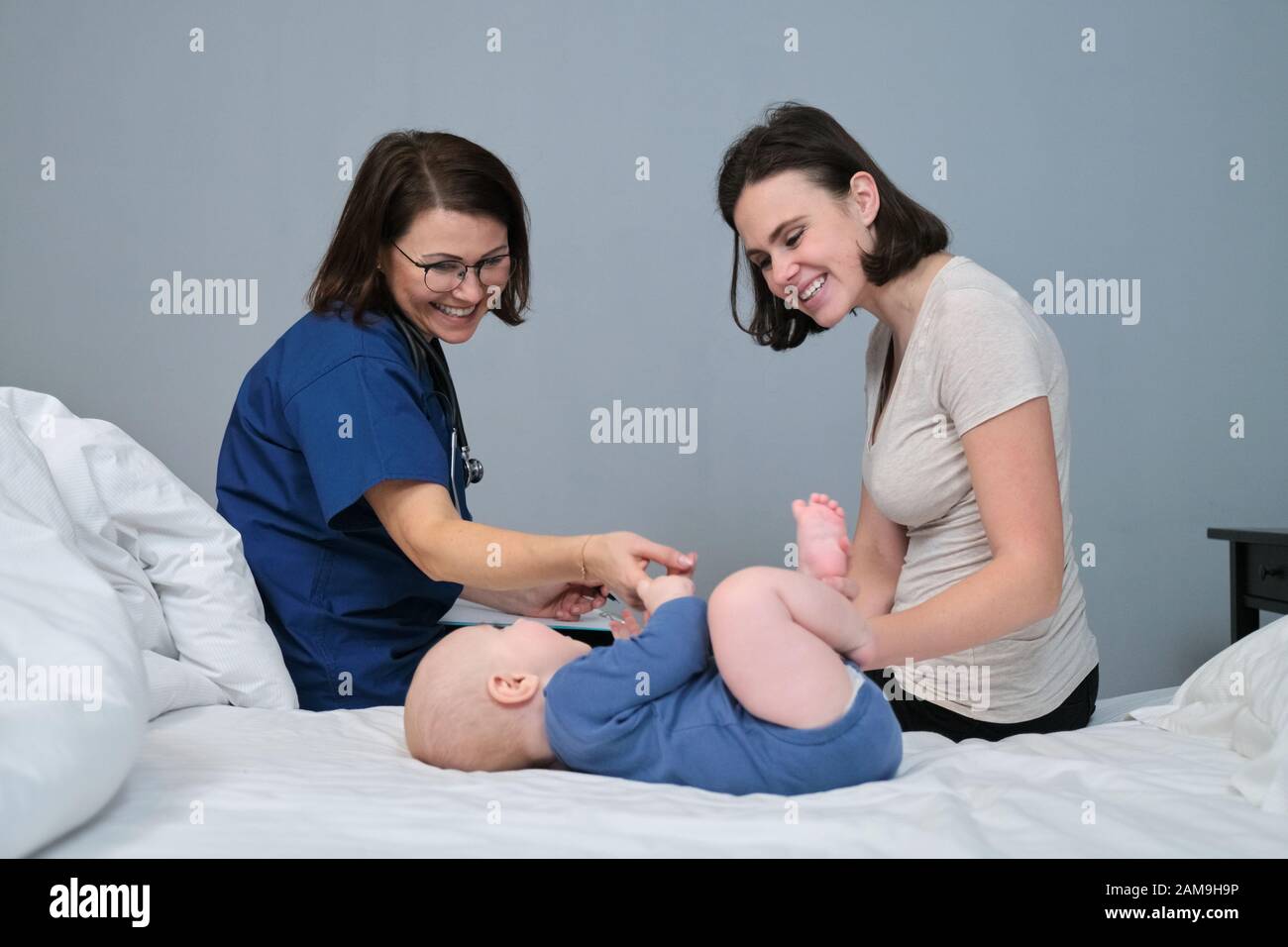 Nurse child home visit mother hi-res stock photography and images - Alamy