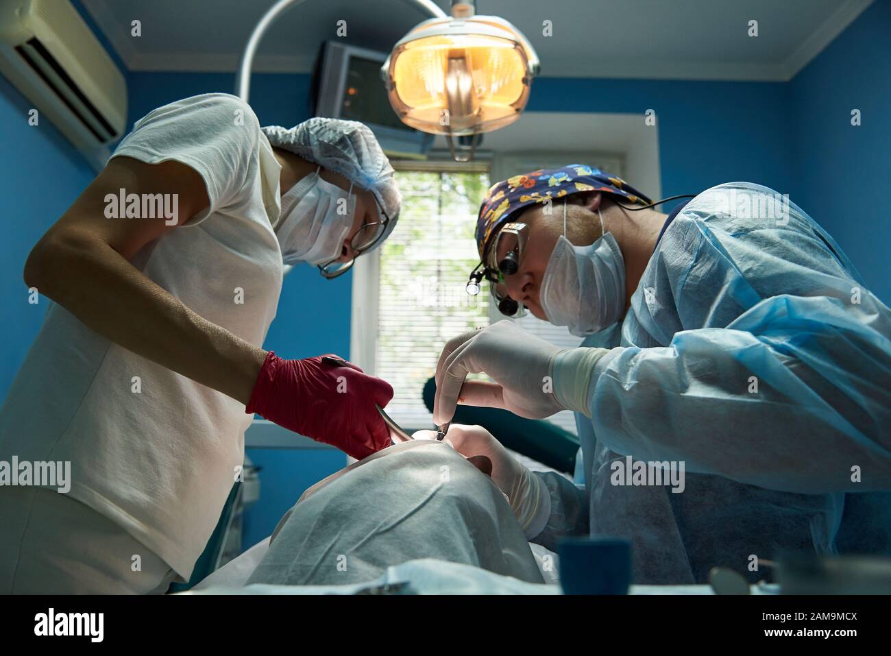Hands of the surgeon hi-res stock photography and images - Alamy