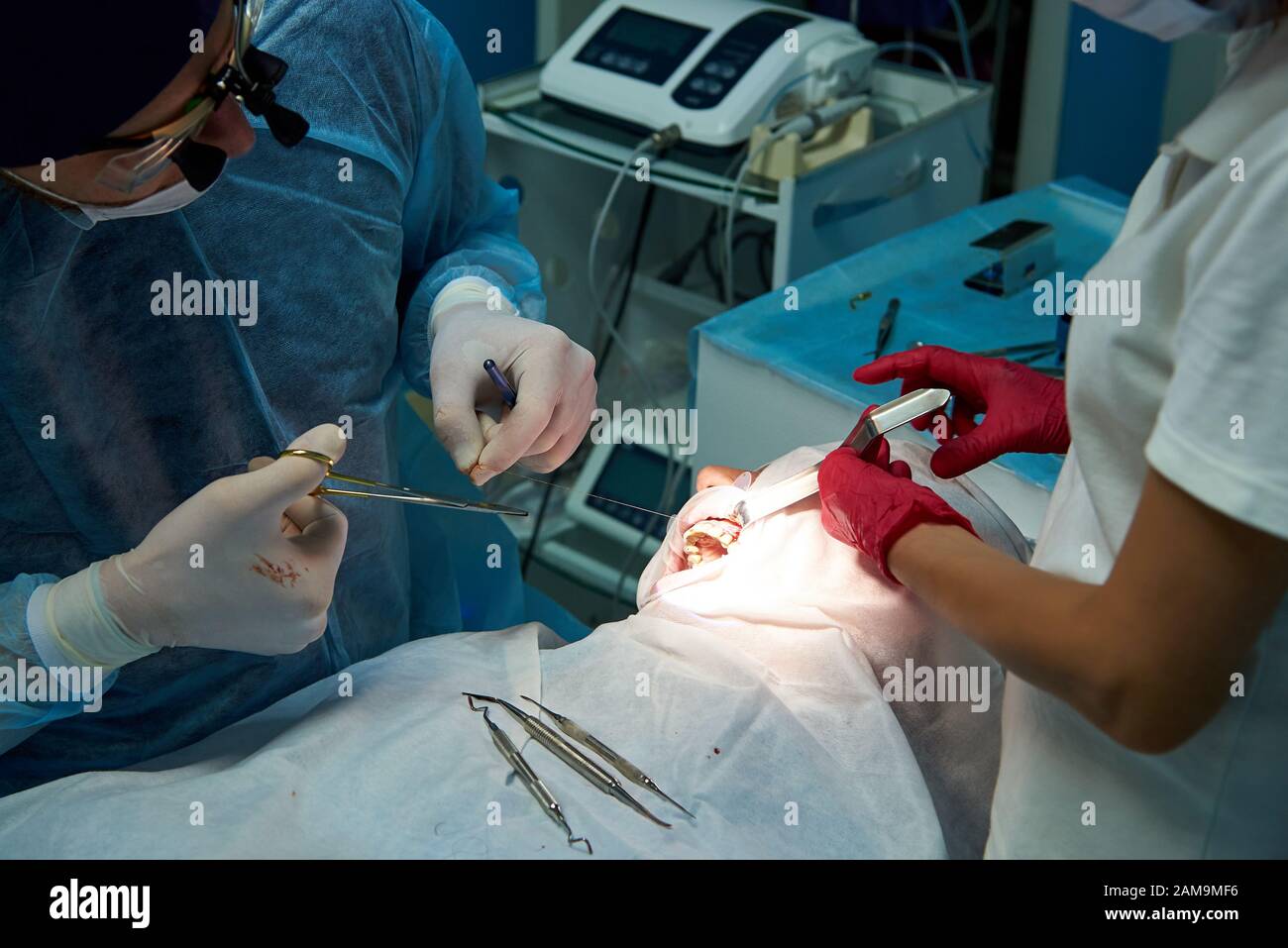Sew up the wound dentist hi-res stock photography and images - Alamy