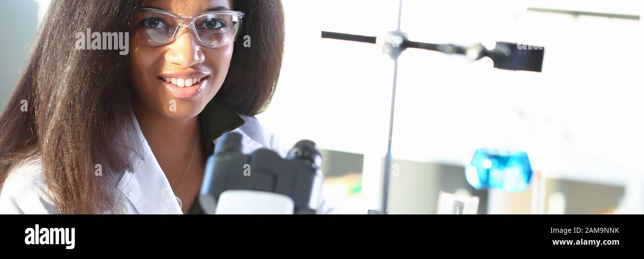 Black female chemist student conducting research Stock Photo - Alamy