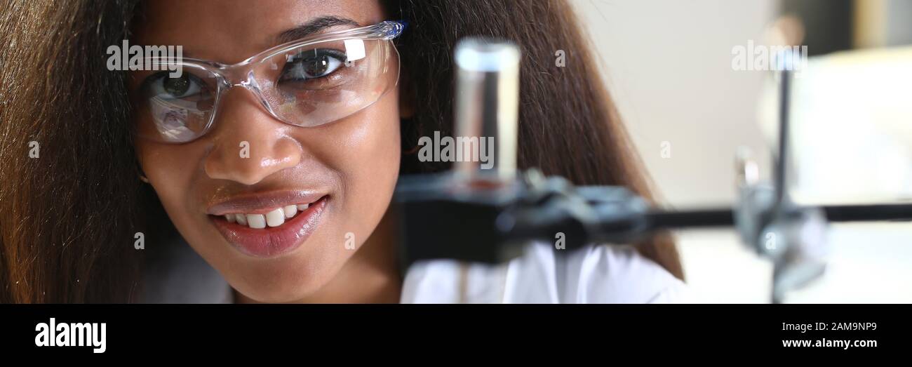 Black female chemist student conducting research Stock Photo - Alamy