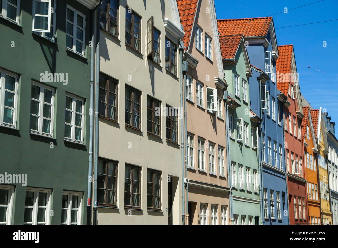 Several old historic houses in Copenhagen in Denmark and their colorful ...
