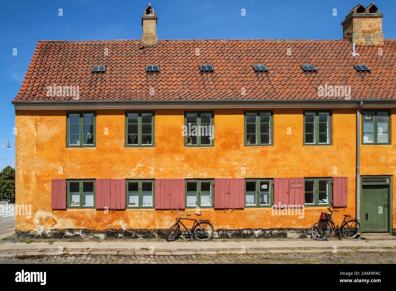 The typical danish terraced houses with their colorful facades. Nice ...