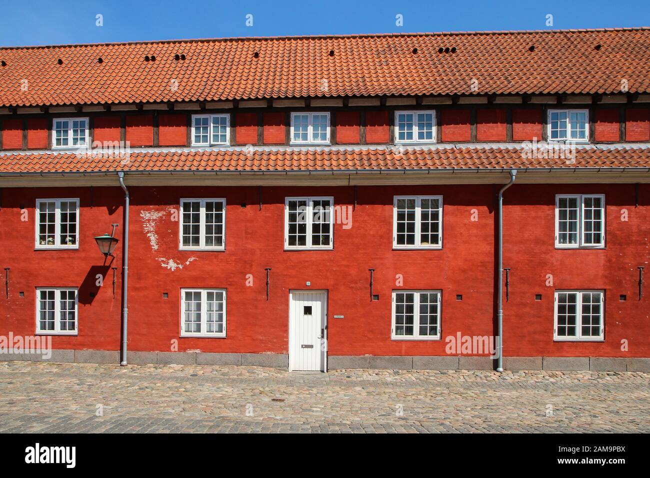 The typical danish terraced houses with their colorful facades. Nice ...