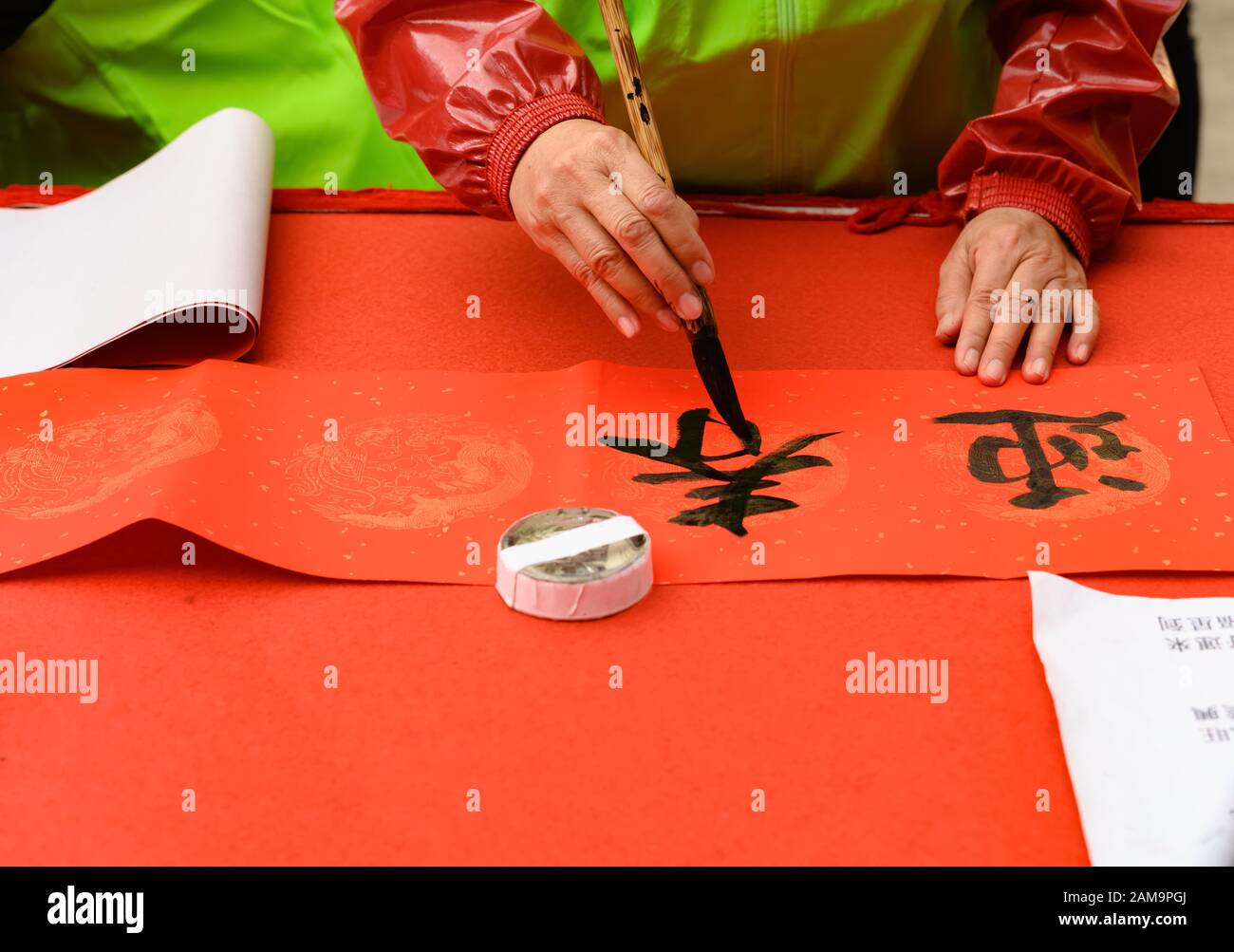 writing Chinese new year scrolls the Chinese means welcome to the new ...