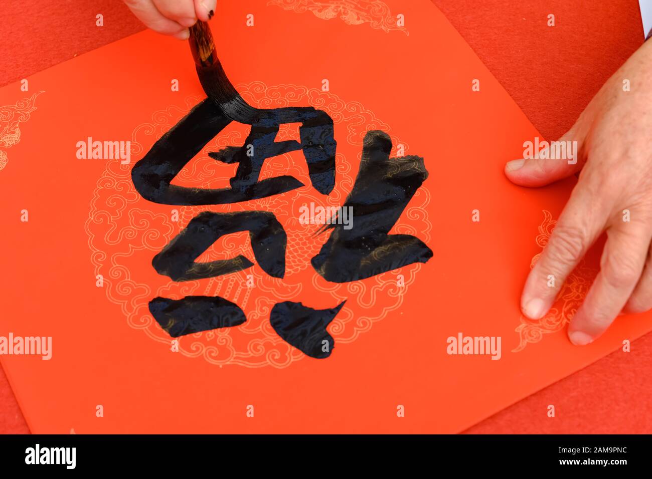 writing Chinese new year scrolls the Chinese means lucky Stock Photo ...