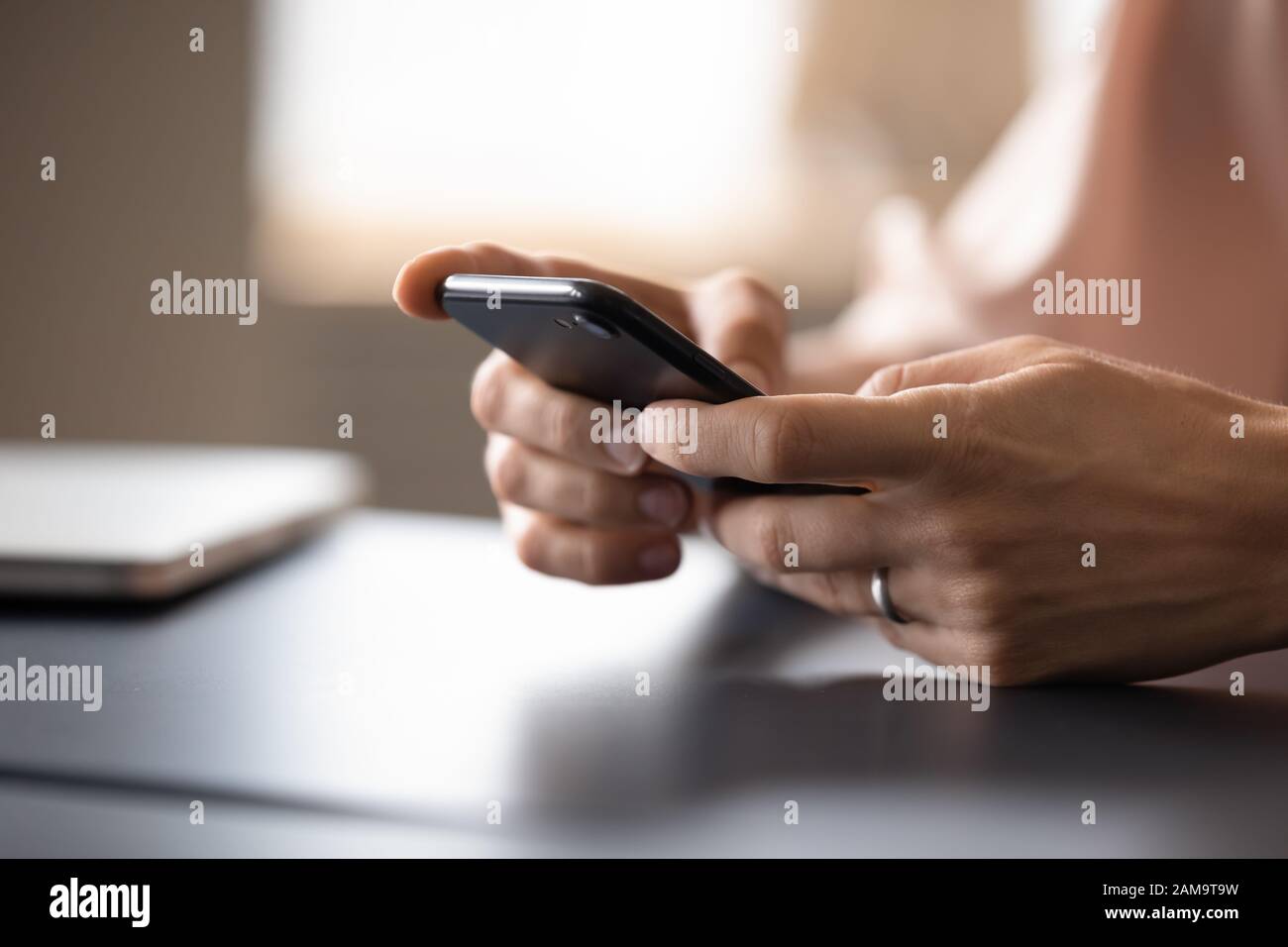 Close up of woman using browsing modern smartphone Stock Photo - Alamy