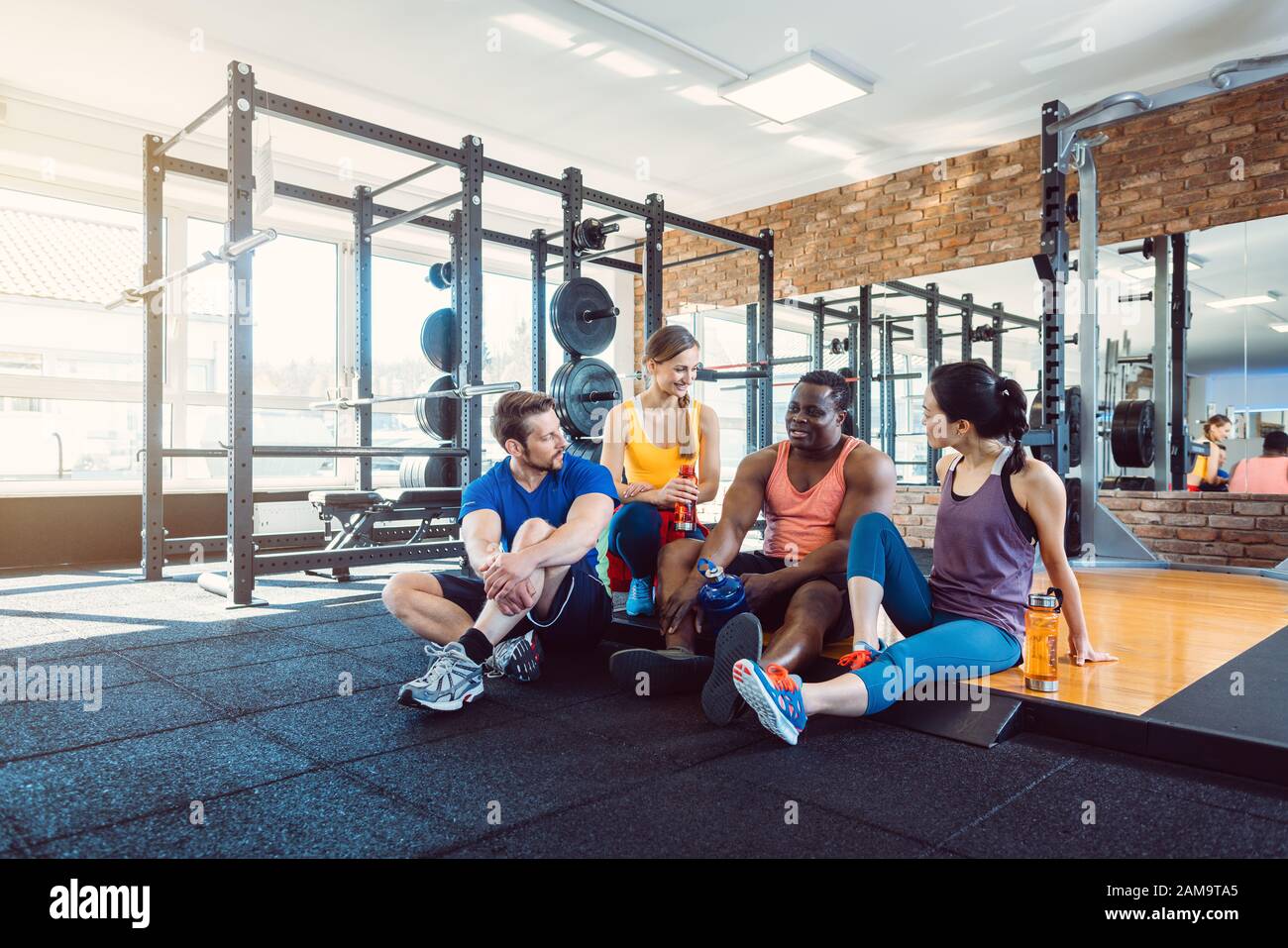 Group of diversity people having fun in the gym Stock Photo - Alamy