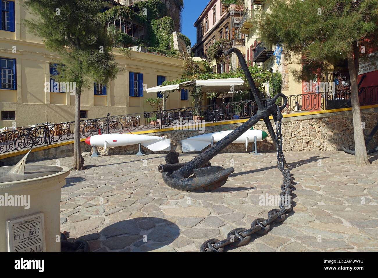 Old anchor and other exhibits outside the Chania Maritime Museum. Crete ...