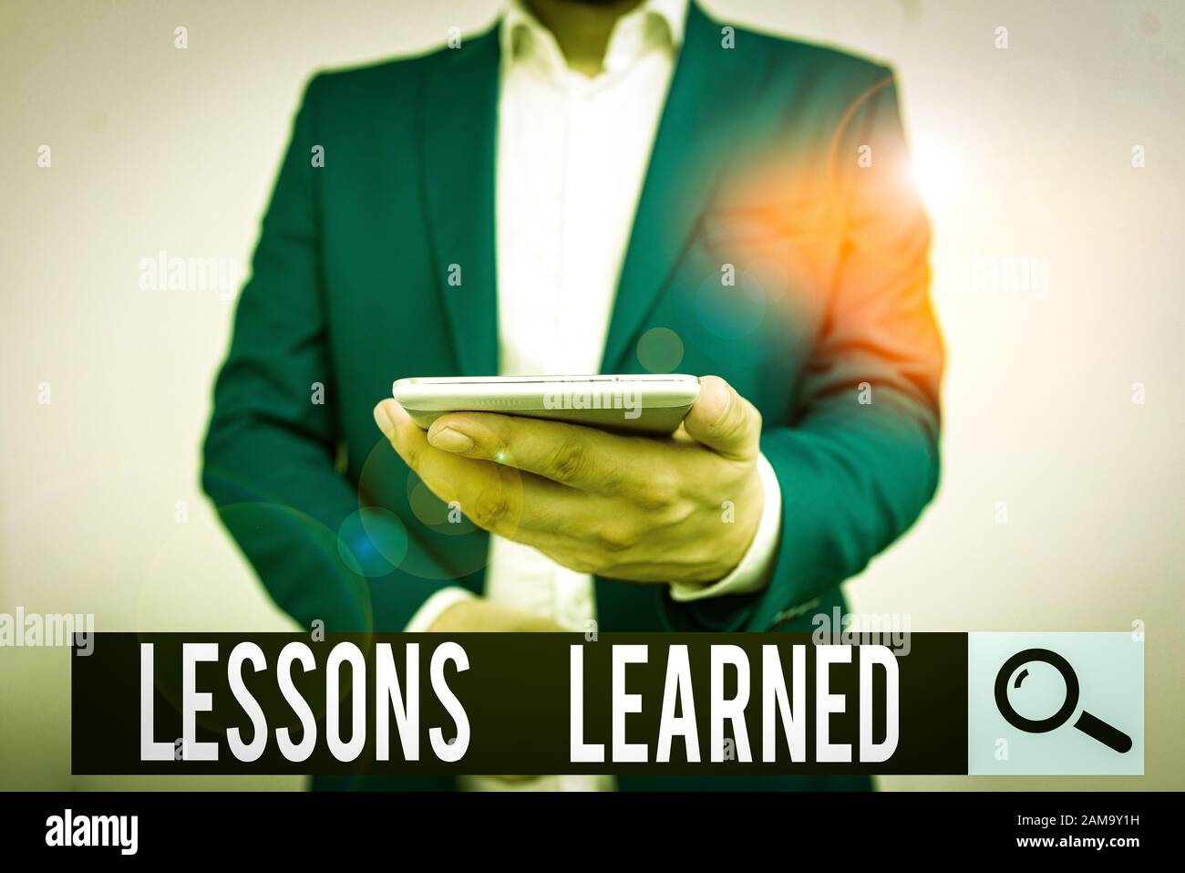 Writing note showing Lessons Learned. Business concept for the knowledge or understanding gained ...
