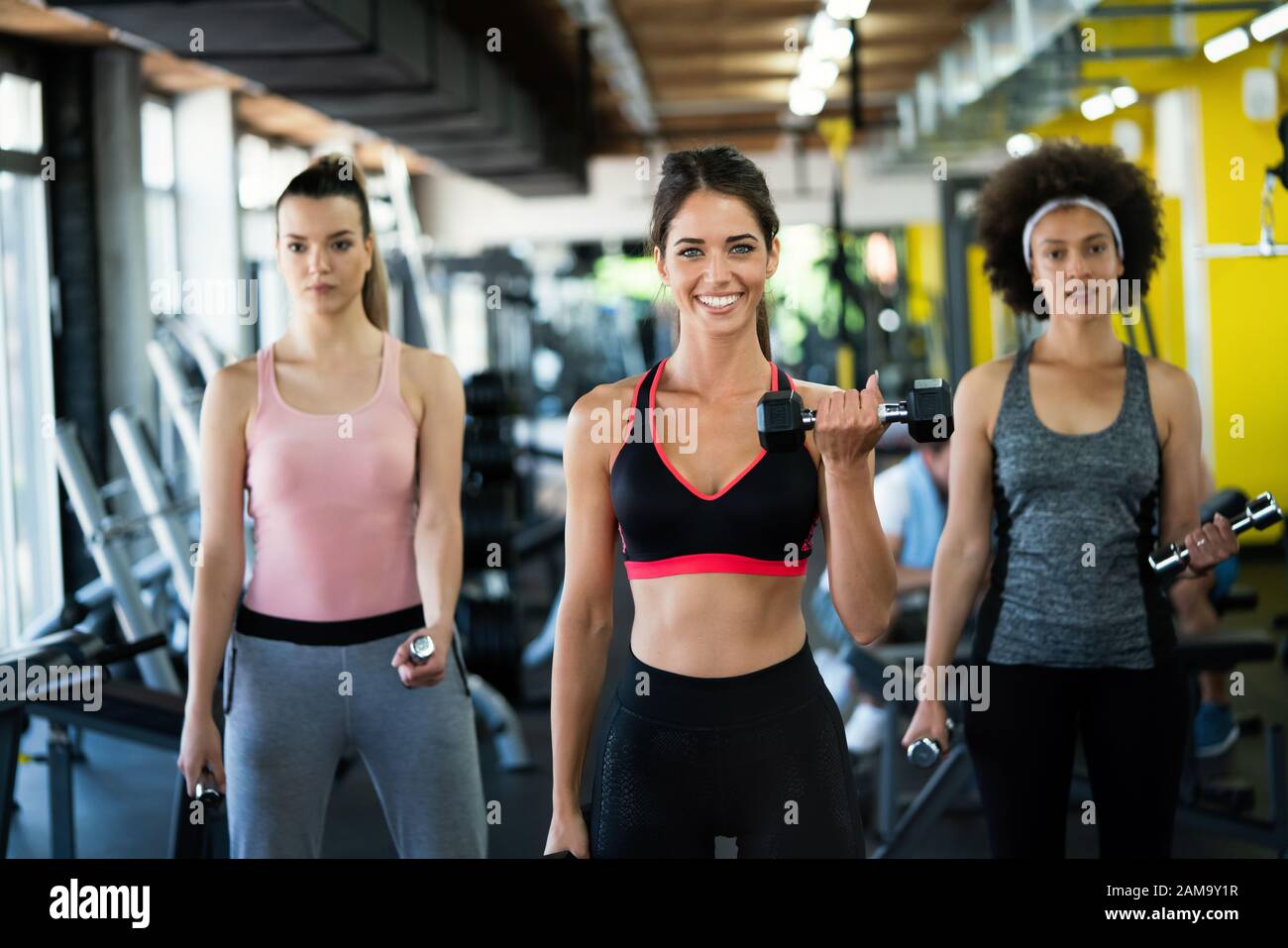 Team workout in gym to reach goals Stock Photo - Alamy