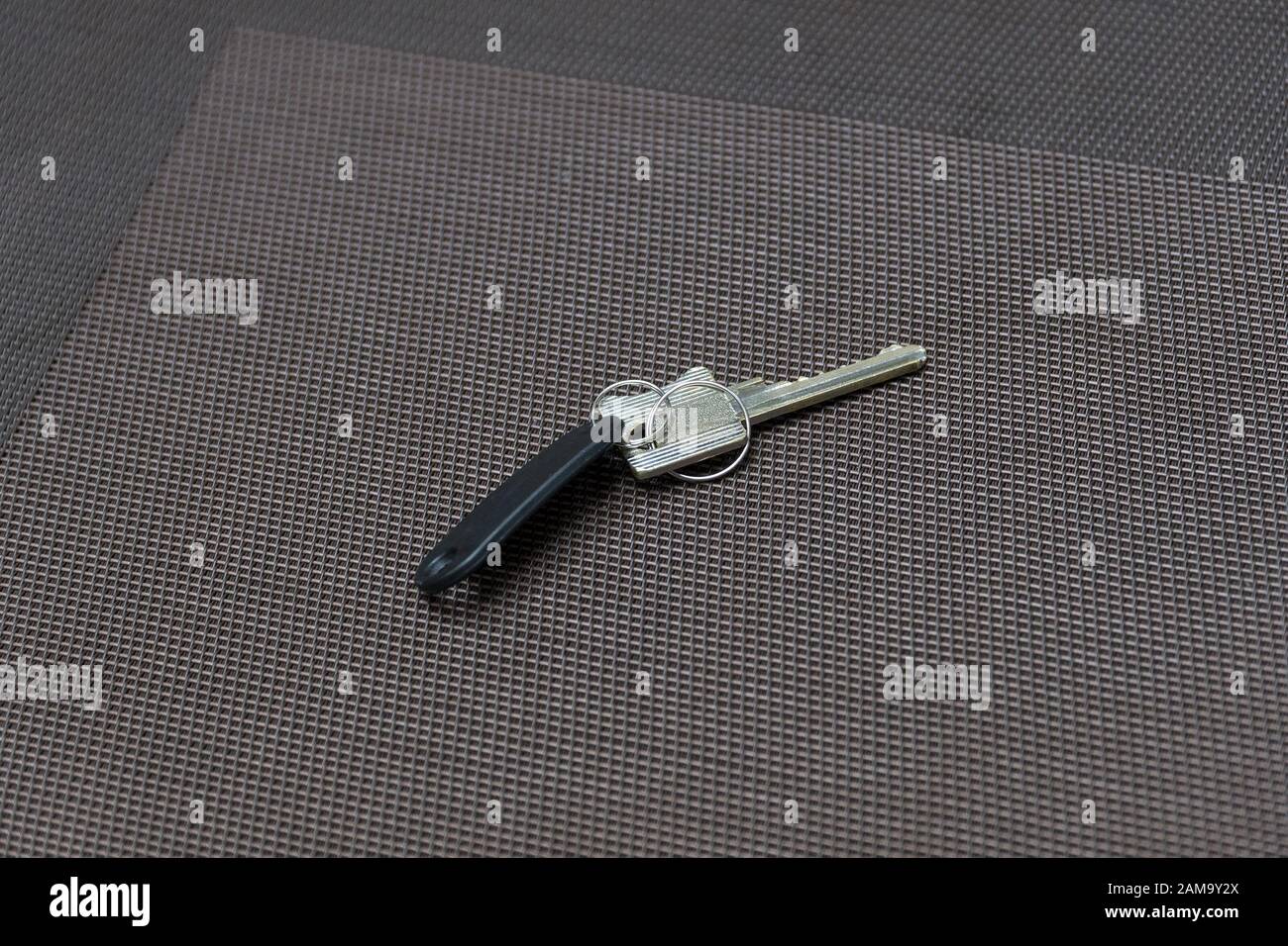 The key with a tag from the hotel room on the table Stock Photo - Alamy