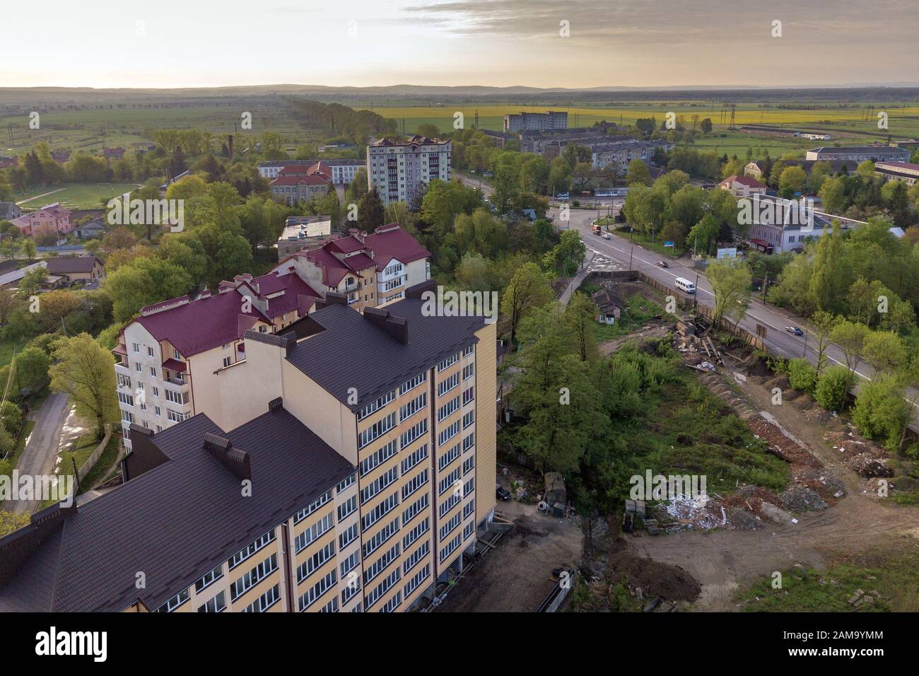 Aerial view of multistory apartment buildings in green residential area ...