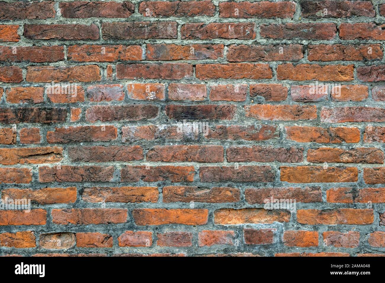 Weathered old red brick background with rough surface Stock Photo - Alamy