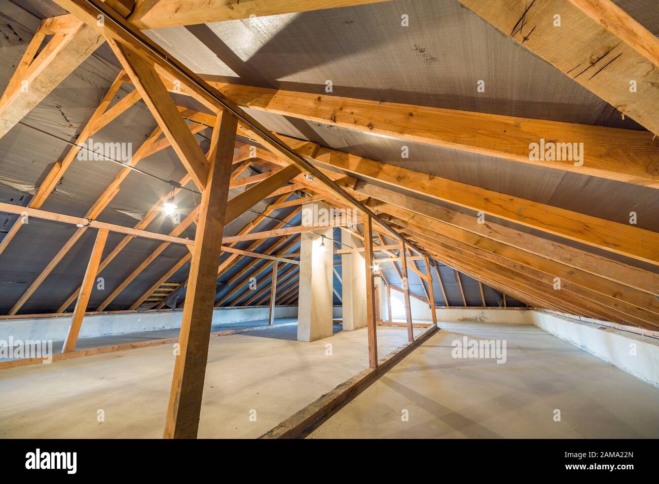 Attic of a building with wooden beams of a roof structure Stock Photo ...