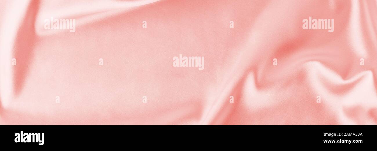 Light pink silk background with folds. Abstract texture of rippled ...