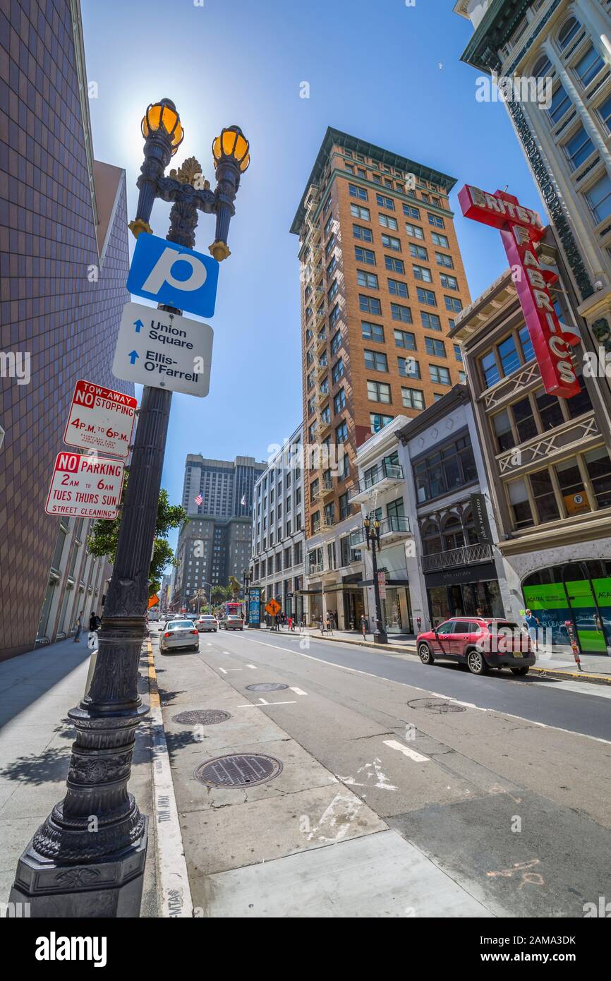 View of street scene and tall buildings on Post Street in Downtown, San ...