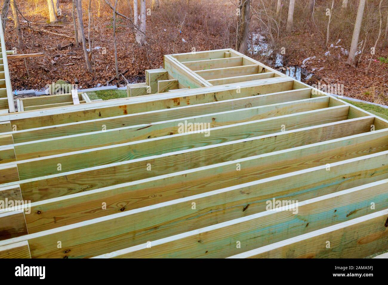 Installing flooring of wooden terrace planks at the patio Stock Photo ...