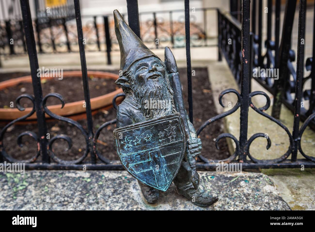 Figurine of dwarf called Ursus in front of High School of Roman Union ...
