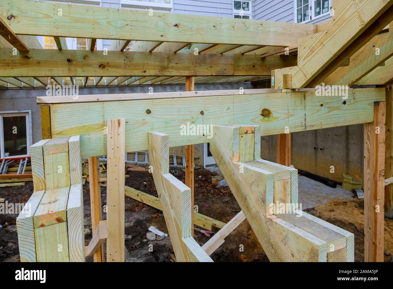 Building a patio with wooden porch terrace flooring in patio outside ...