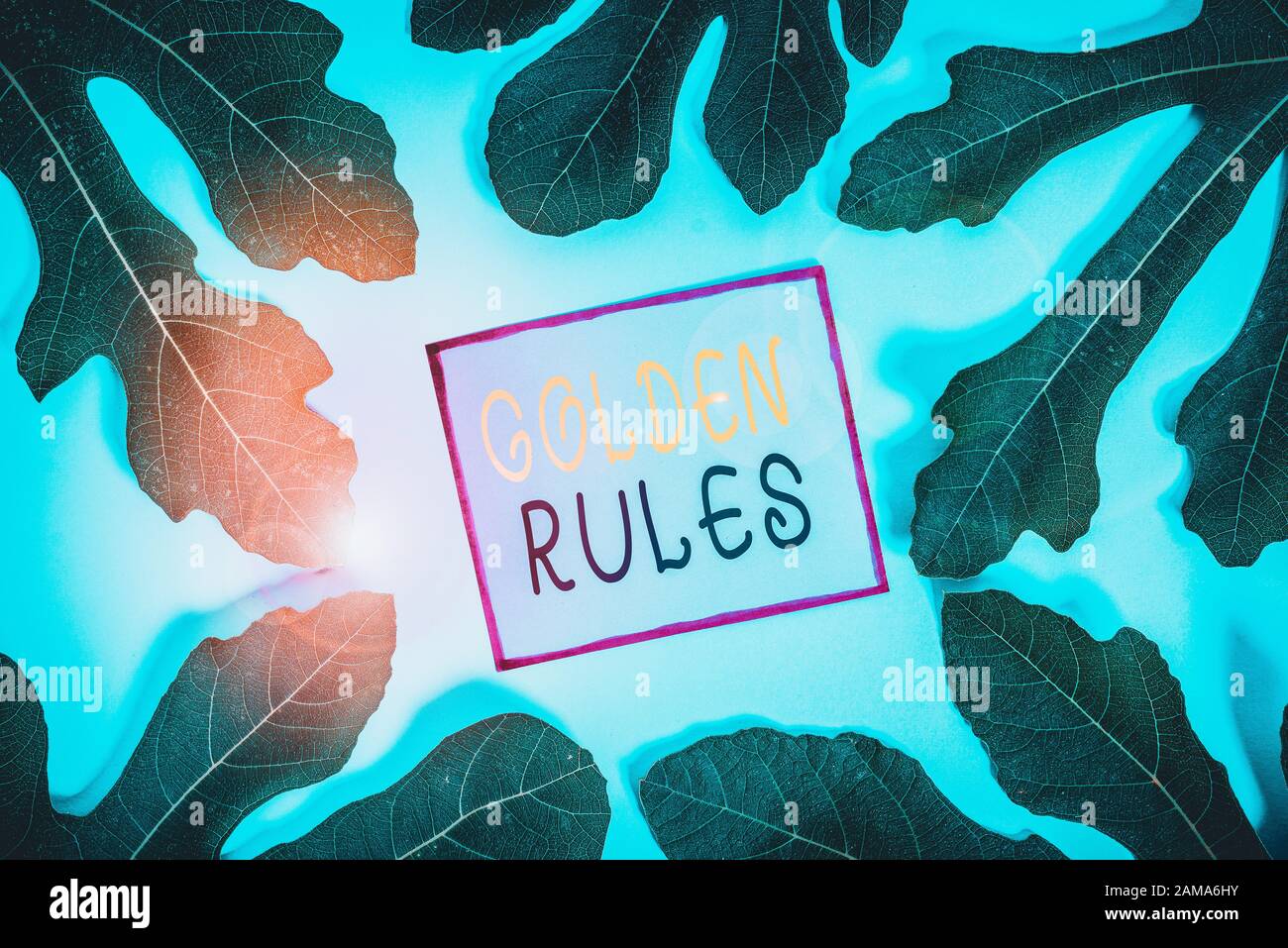 Writing note showing Golden Rules. Business concept for basic principle ...