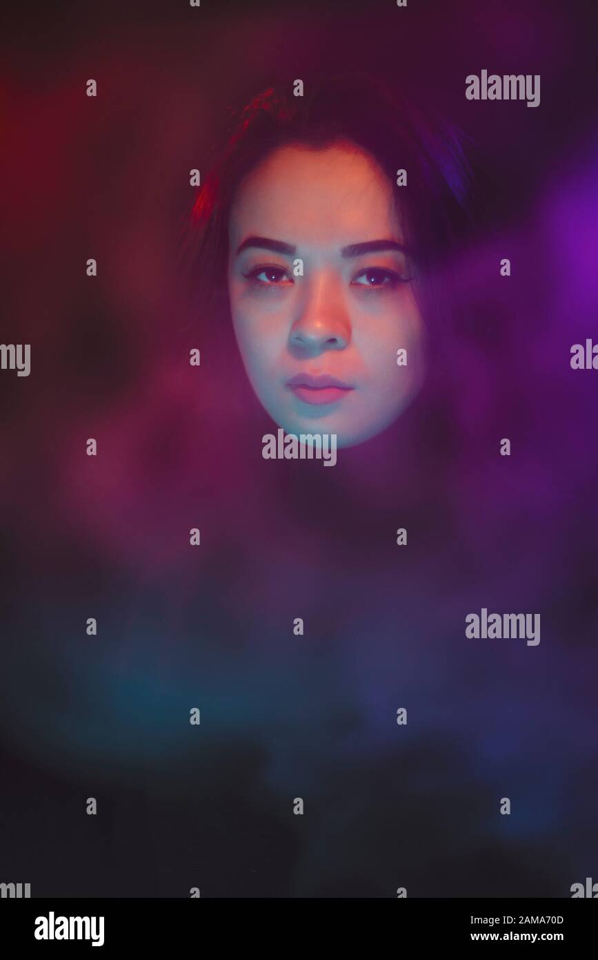 Color light on a female portrait. Neon light Stock Photo - Alamy