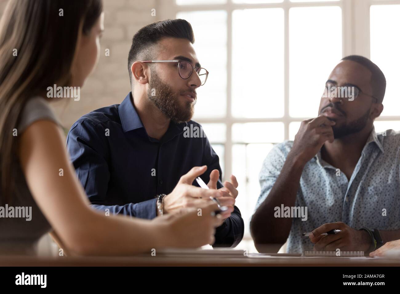 Closeup focused business woman discussing hi-res stock photography and ...