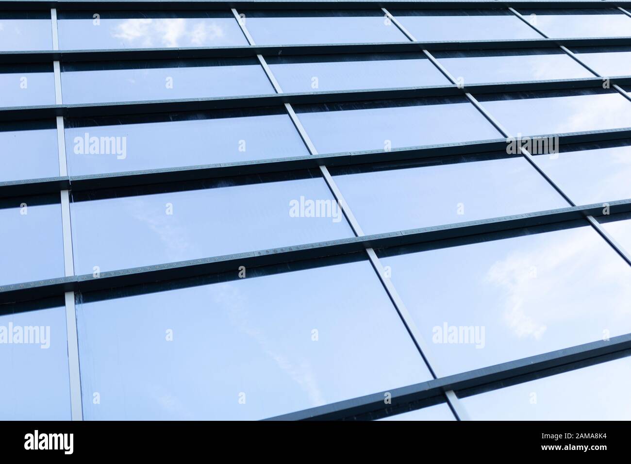 glass view of a modern office building Stock Photo - Alamy