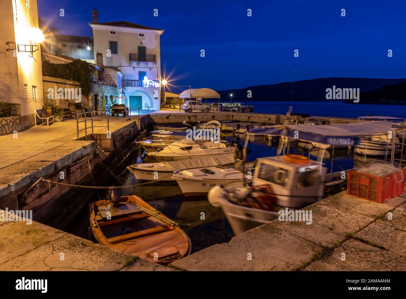 Valun, Island Cres, Croatia - December 31, 2019: evening in the old ...